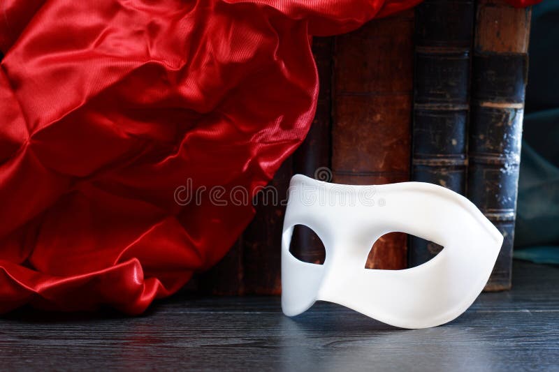 Mask And Books stock photo. Image of tragedy, masking - 63484974