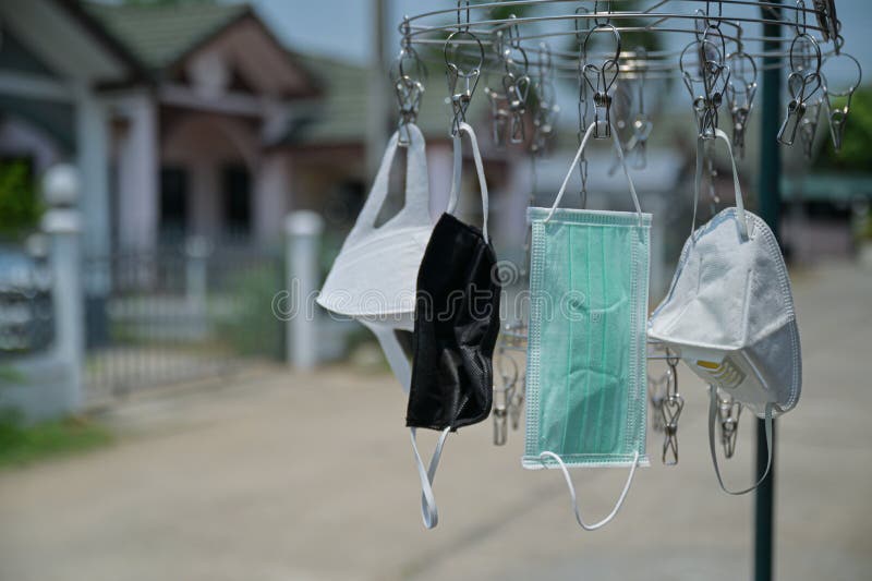 Mask on the Clothes Rack in the Sun Stock Photo - Image of pollution ...