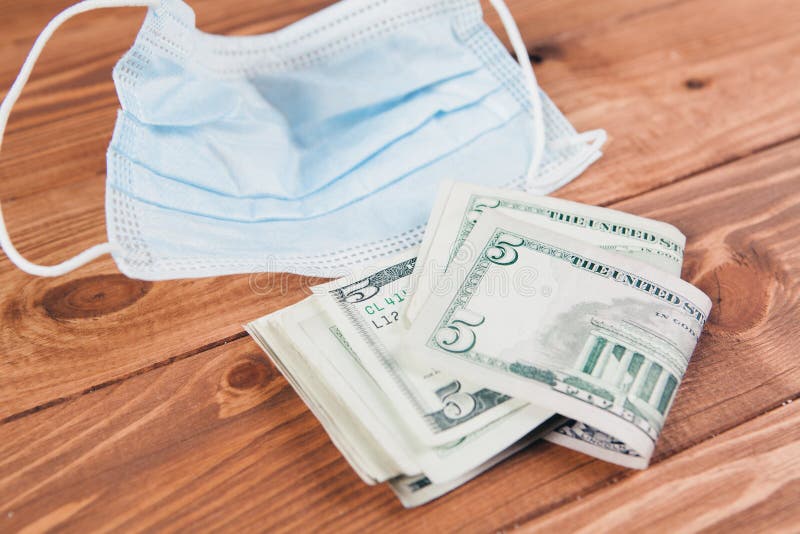 Mask and dollar bills stock image. Image of covid, concept - 216697731