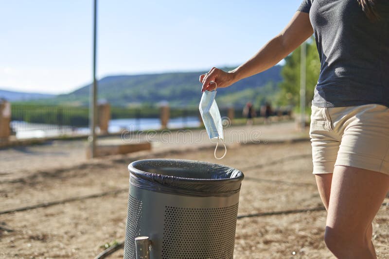 Mask in garbage at beach stock image. Image of mask - 223417693