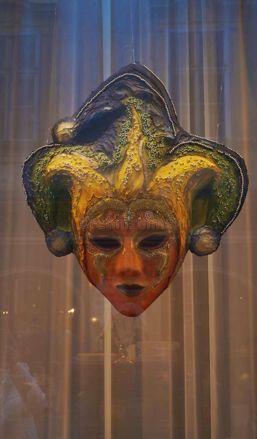 Mask of Jester Behind the Glass Stock Photo - Image of cover, carnivale ...