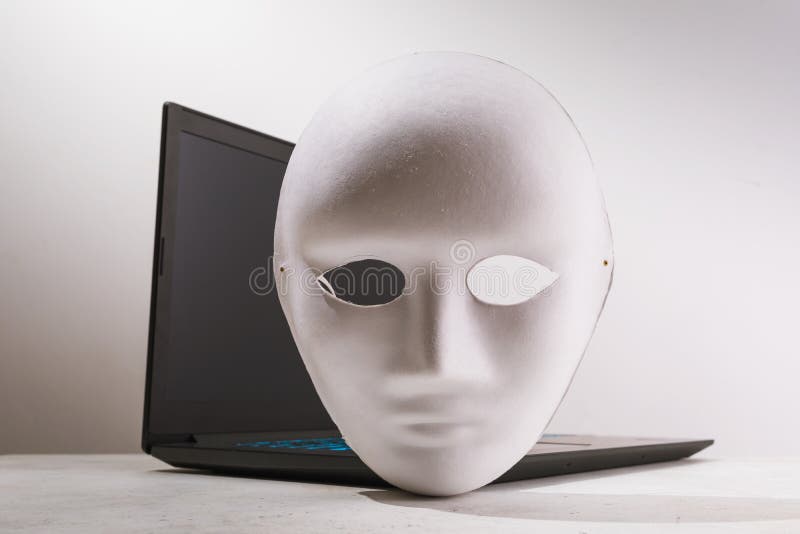 Mask and Laptop on the Table Close-up, Concept on the Topic of ...