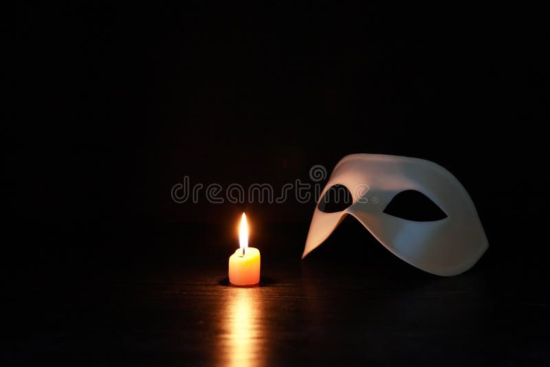 Mask Near Candle stock photo. Image of feeling, performance - 117205688