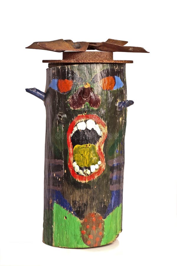 Mask Painted on a Tree Stump Stock Image - Image of painted, mask: 11183171