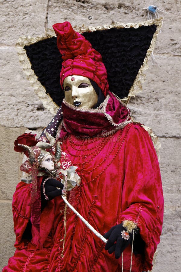 Mask and red robe stock image. Image of black, robe, dress - 13079381