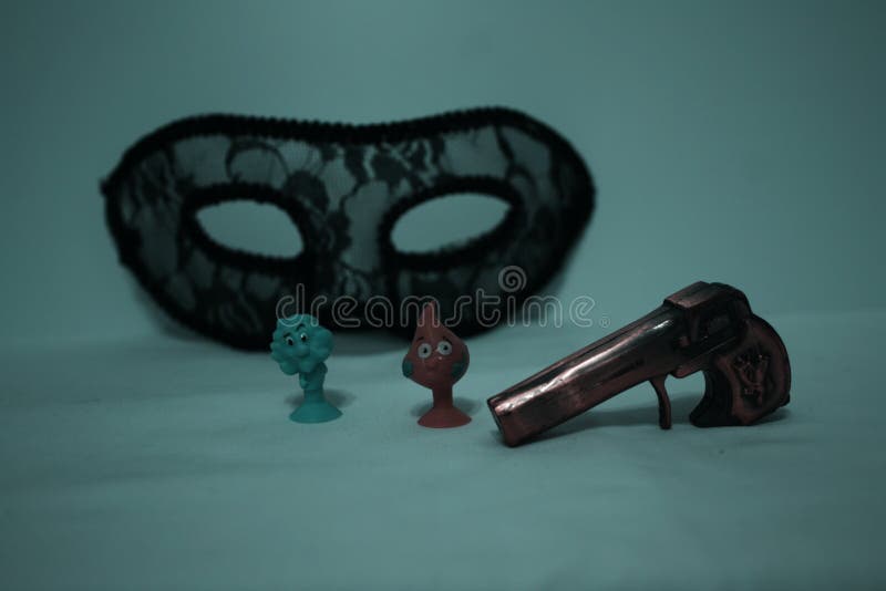 MASK, VEGETABLES and GUN stock image. Image of macrophotography - 125851471