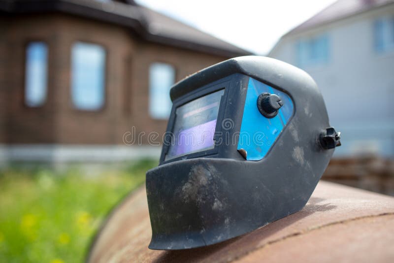 Mask Welder at a Construction Site Stock Photo - Image of skill, iron ...