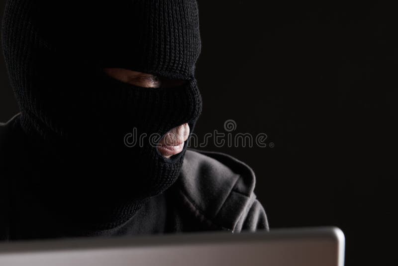 Masked Man with Computer Over Grey Stock Image - Image of computer ...