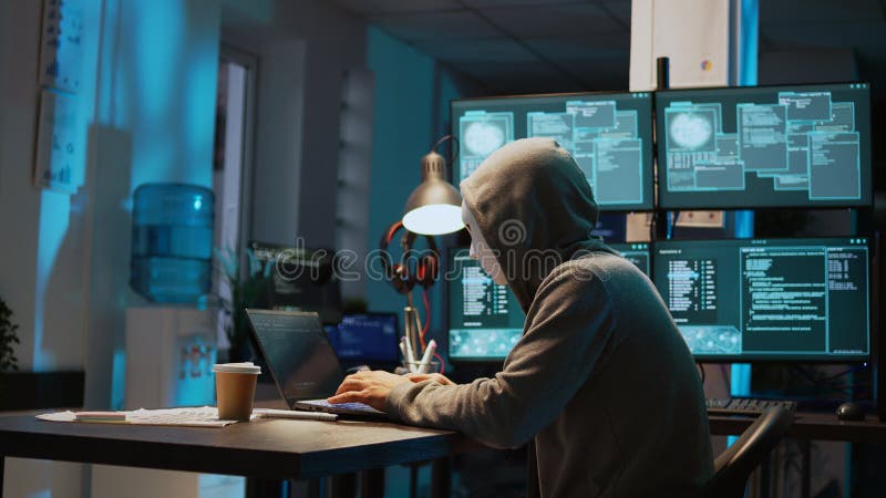 Masked Data Thief Hacking Computer Network at Night, Stock Photo ...