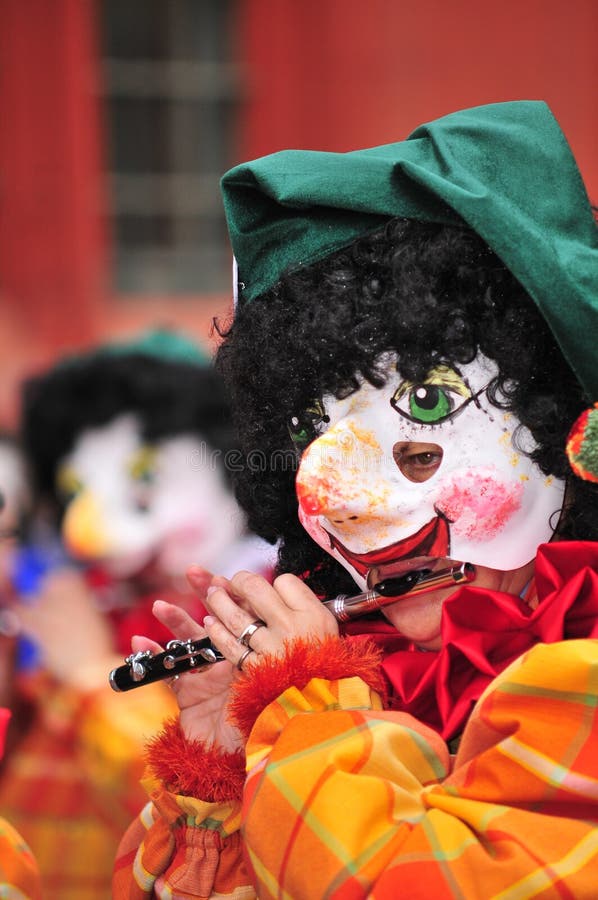 Masked flute player stock image. Image of color, music - 8527965