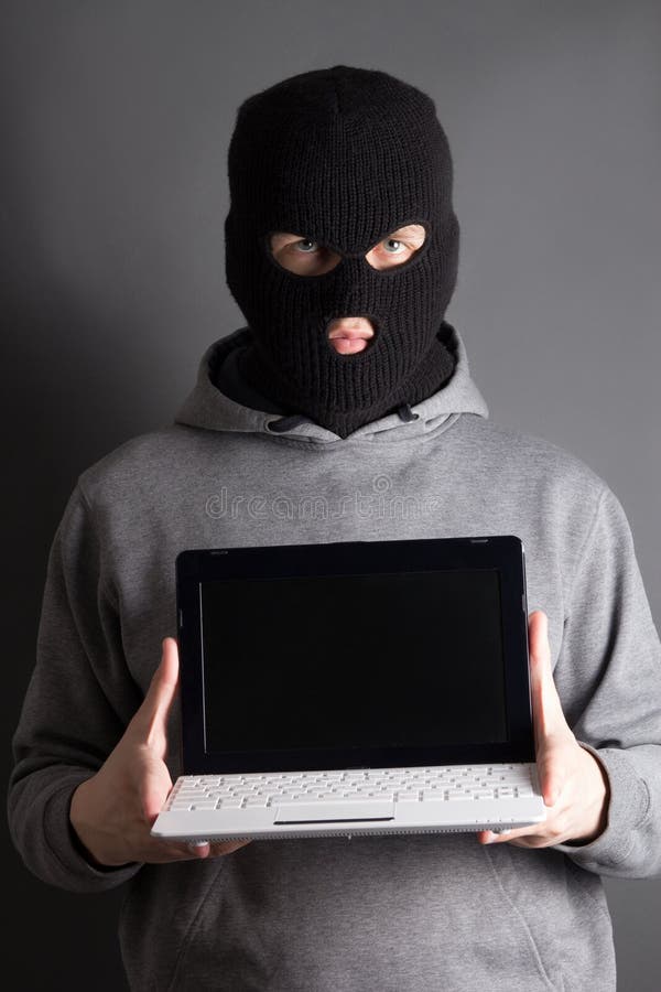Masked Man with Computer Over Grey Stock Image - Image of computer ...