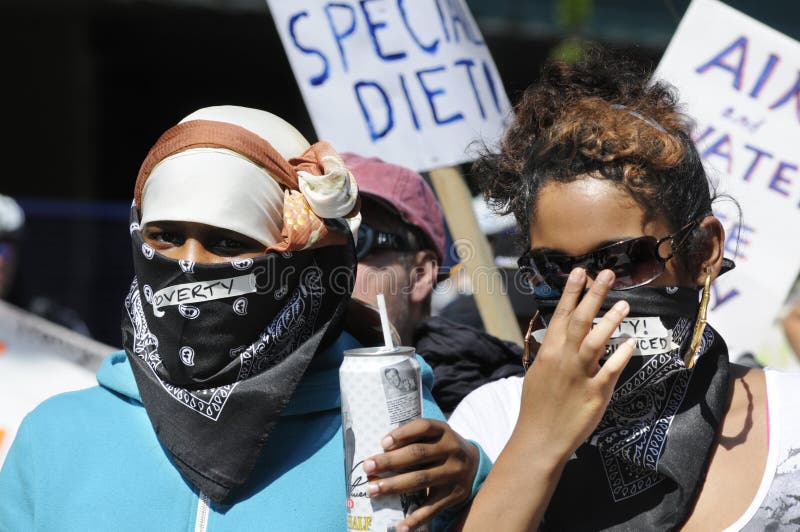 Masked protesters. editorial stock image. Image of message - 26745744