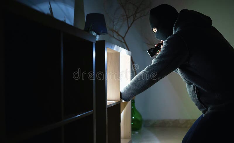 Masked Robber with Flashlight Torch Stock Image - Image of mask ...
