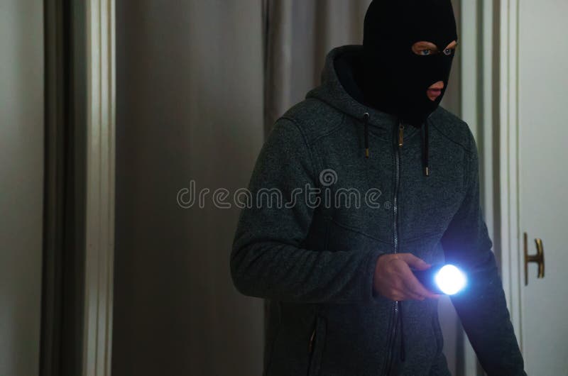 Masked Robber with Flashlight Torch Stock Photo - Image of crime ...