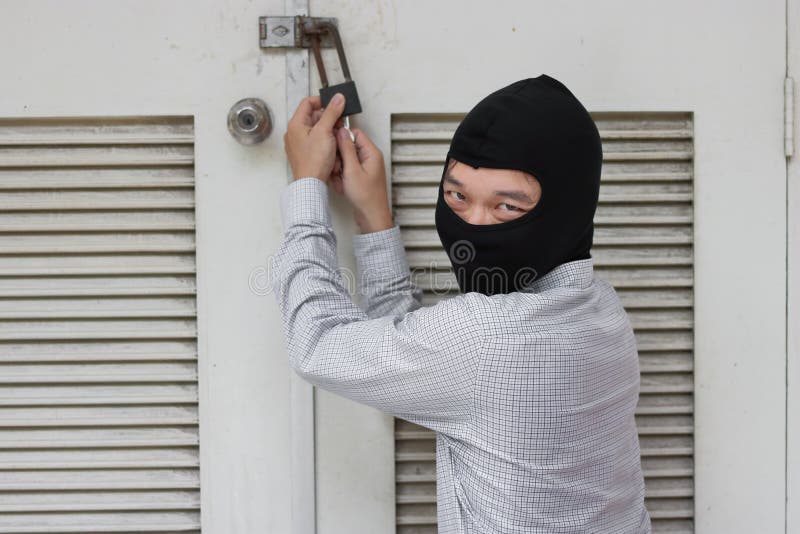 Robber Entering in House stock photo. Image of interior - 222459374