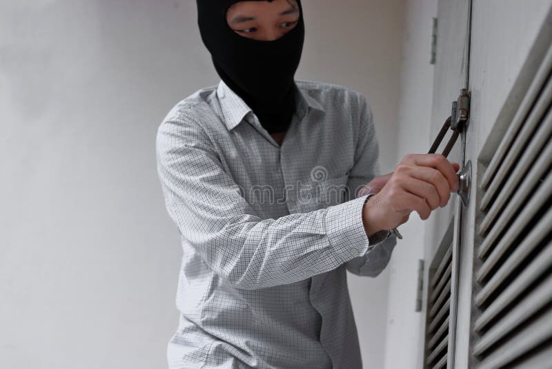 Robber Entering in House stock photo. Image of interior - 222459374