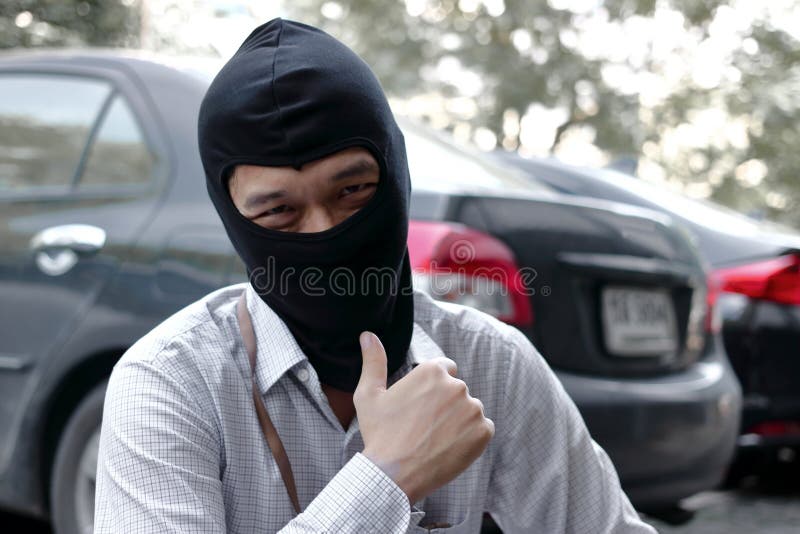 Masked Thief in Black Balaclava Trying To Break into Car Stock Photo ...