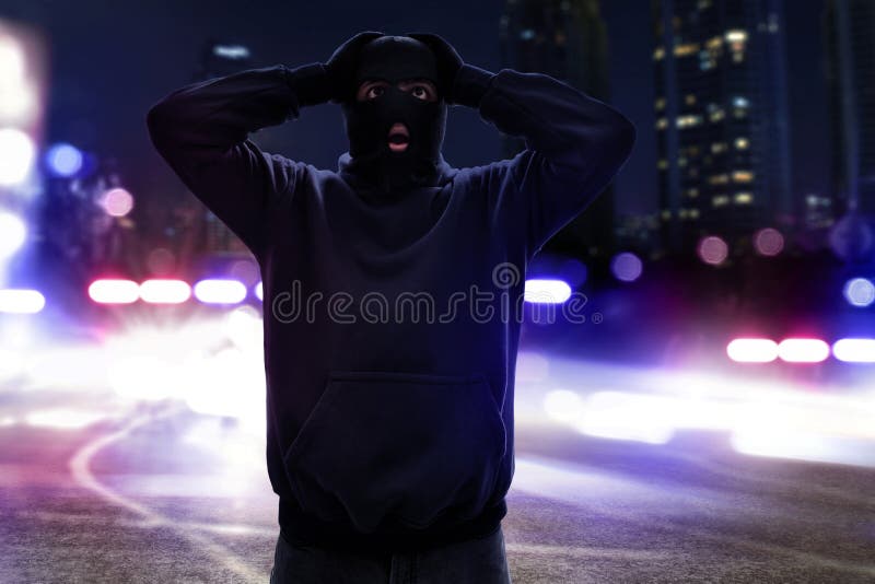 Masked Thief Caught by Police Stock Photo - Image of dangerous, concept ...
