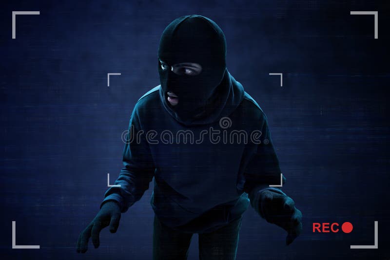 Masked Thief Caught on Security Camera Stock Photo - Image of camera ...