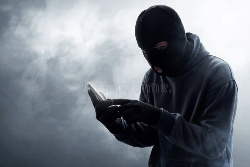 Thief Using a Stolen Mobile Phone Stock Image - Image of criminal, evil ...