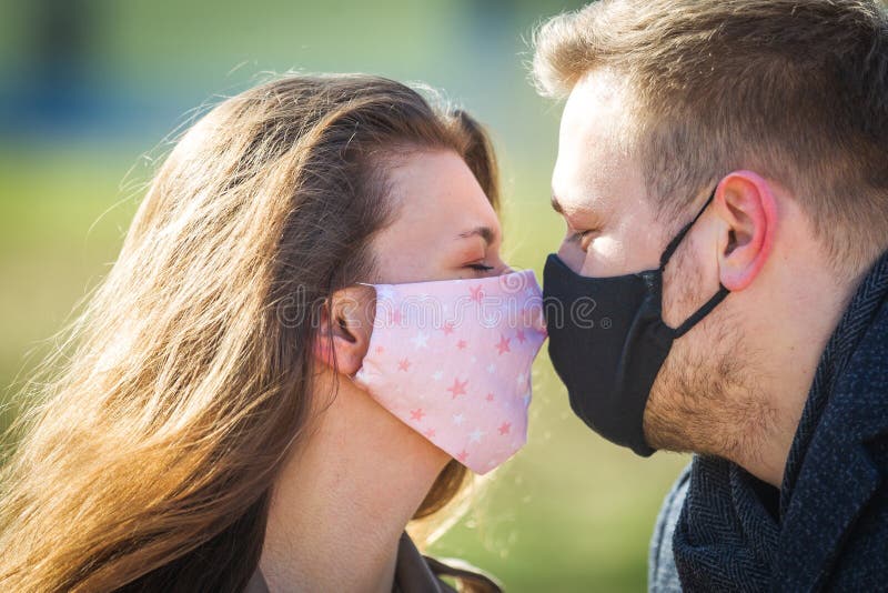 Masked Young Couple Walking In The Park Stock Image Image Of Female