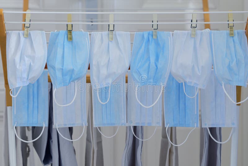 Masks on a clothesline stock image. Image of sars, coronavirus - 209117567