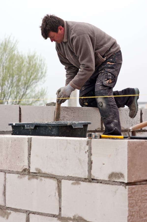 Mason at work stock photo. Image of layer, male, brick - 9738868