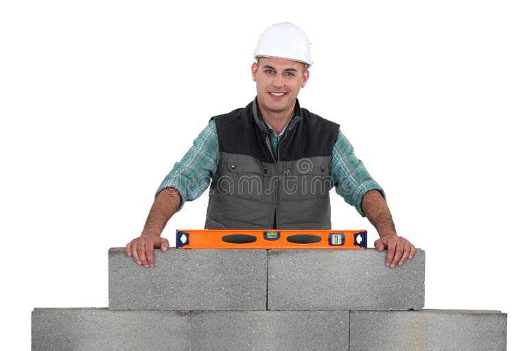 Mason checking level stock image. Image of green, masonry - 35904559
