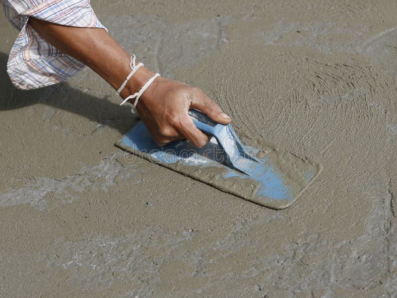 Mason Hand Finishes a Newly Poured Concrete Floor Stock Image - Image ...