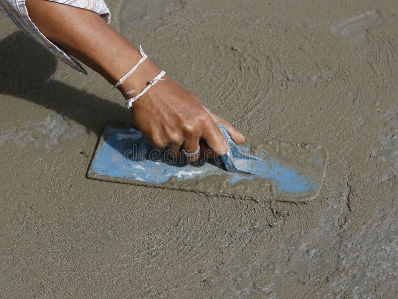 Mason Hand Finishes a Newly Poured Concrete Floor Stock Image - Image ...