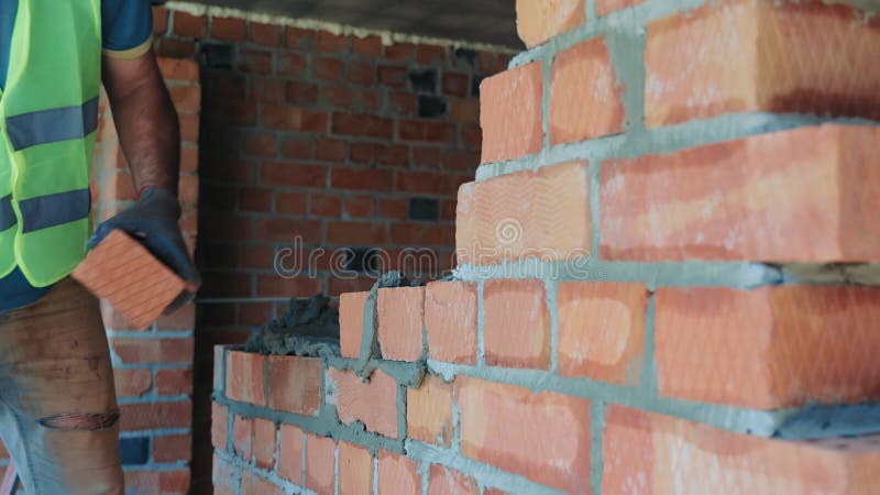 Mason Laying Bricks with Precision. a Close-up Shot of a Mason ...