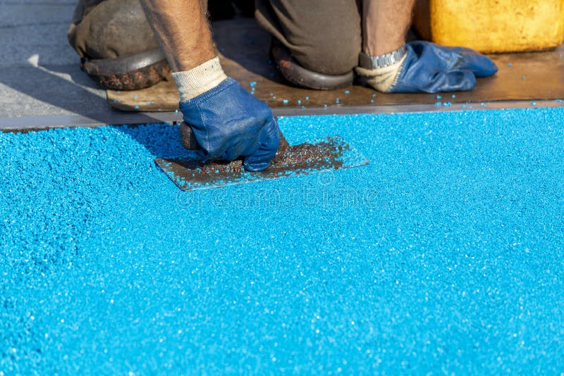 Mason Leveling Rubber Coating for Playgrounds Stock Photo - Image of ...