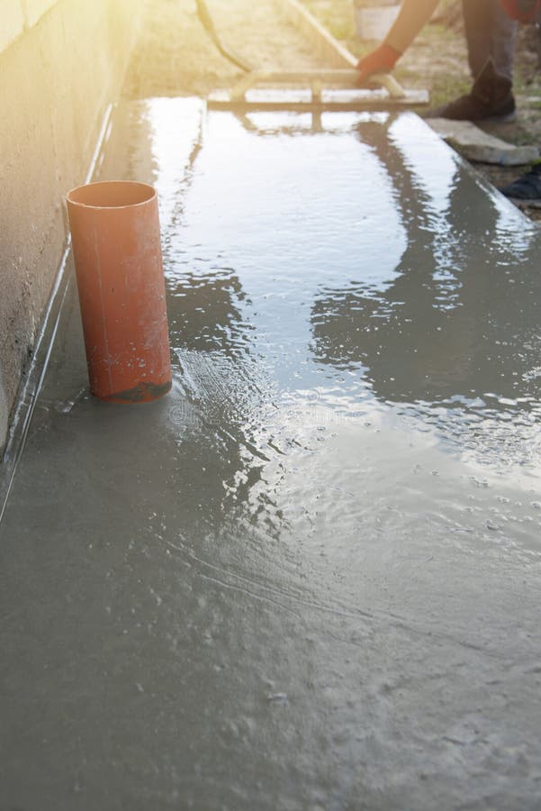 Mason Leveling and Screeding Concrete Floor Base Stock Photo - Image of ... Mason Leveling and Screeding Concrete Floor Base Stock Photo - Image of ...