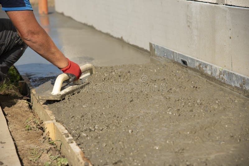 Mason Leveling and Screeding Concrete Floor Base Stock Photo - Image of ... Mason Leveling and Screeding Concrete Floor Base Stock Photo - Image of ...