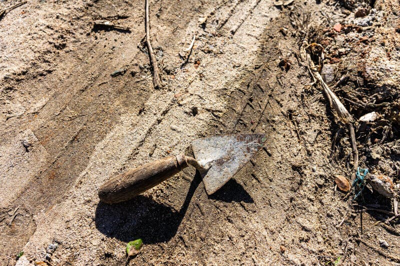 Mason S Trowel Lying on the Ground, Worn Edges Telling Tales of Hard ...
