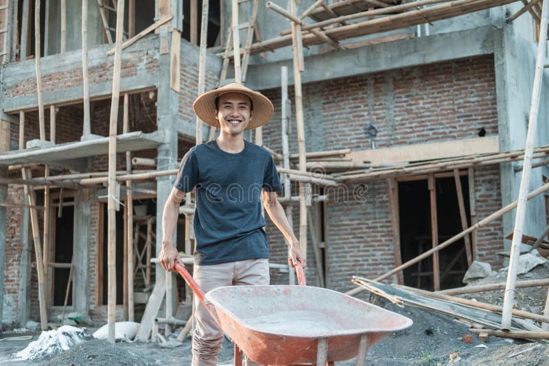 Mason Smile while Pushing Wheelbarrow Stock Image - Image of mason ...