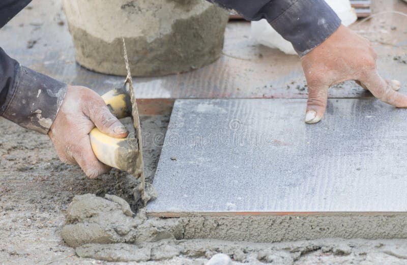 Mason tiling on floor stock image. Image of construction - 69573339