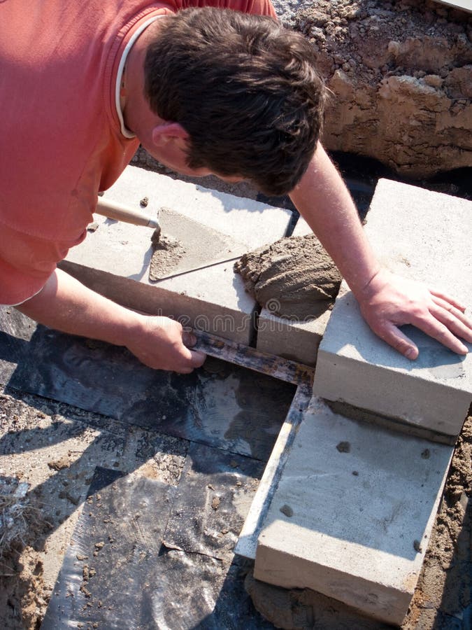 Mason at work stock image. Image of checks, mason, foundation - 19316777