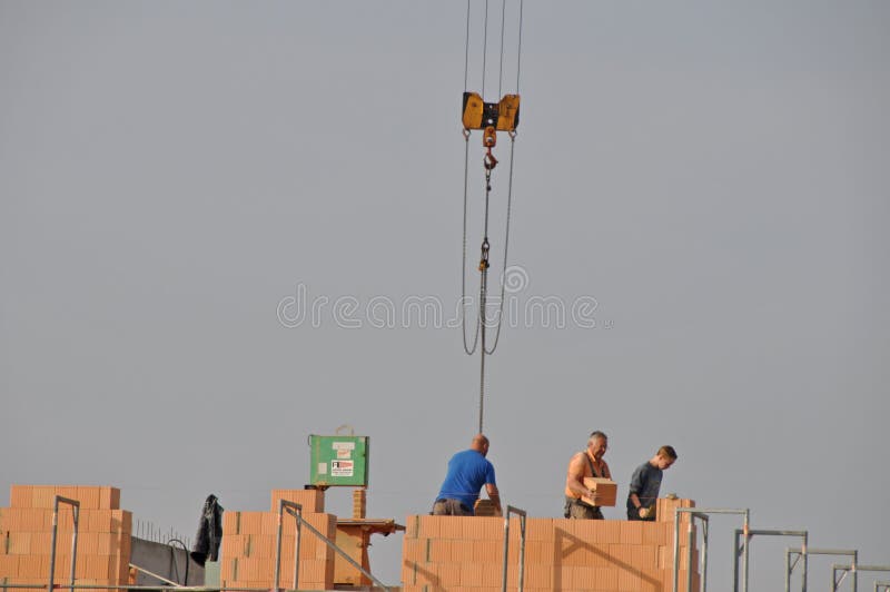 Mason at work editorial photo. Image of level, layer - 30466071