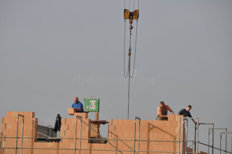 Mason at work editorial stock image. Image of master - 30466079