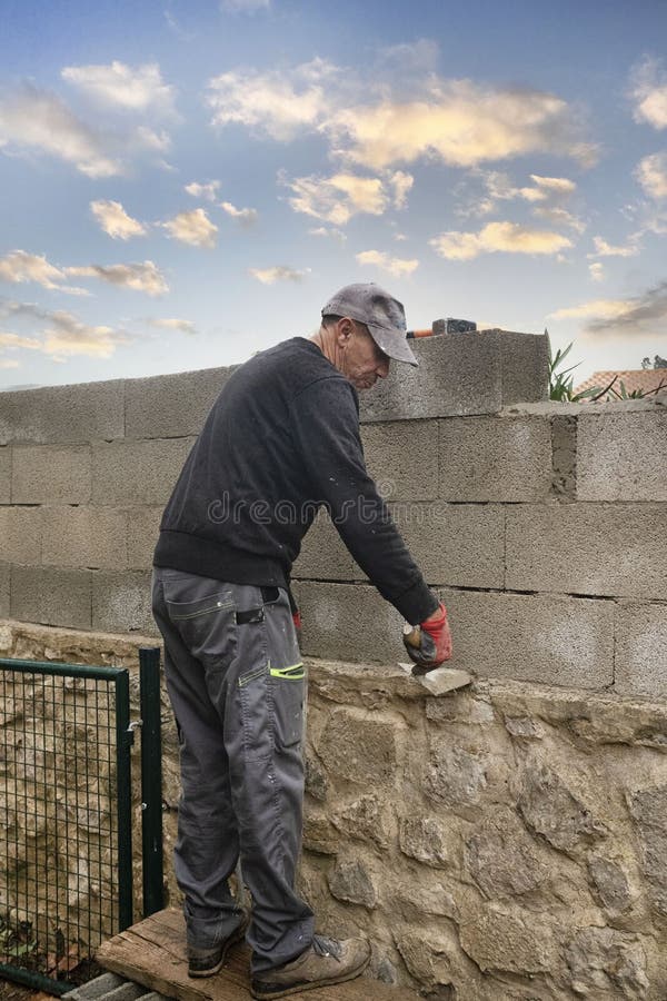 Mason worker bricklayer stock image. Image of breeze - 263408657