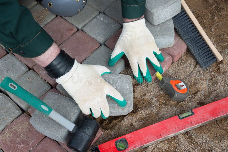 Mason Worker Making Sidewalk Pavement Stock Image - Image of granite ...