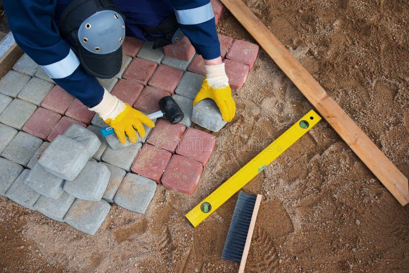 Mason Worker Making Sidewalk Pavement Stock Photo - Image of pavement ...