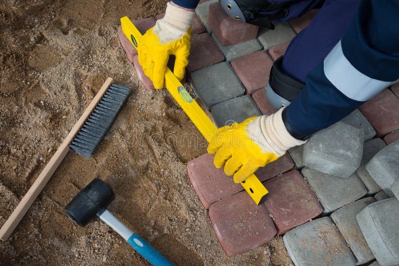 Mason Worker Making Sidewalk Pavement Stock Photo - Image of level ...