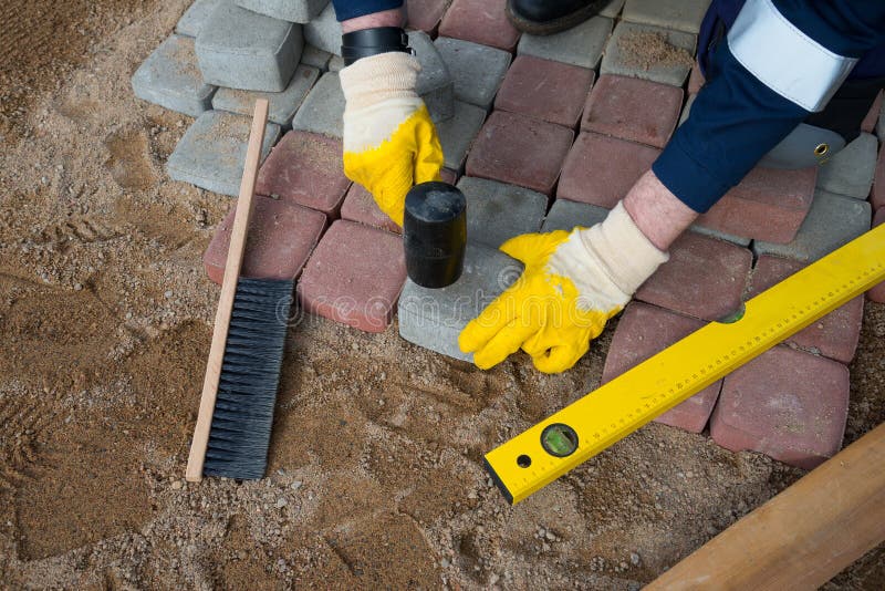 Mason Worker Making Sidewalk Pavement Stock Photo - Image of masonry ...