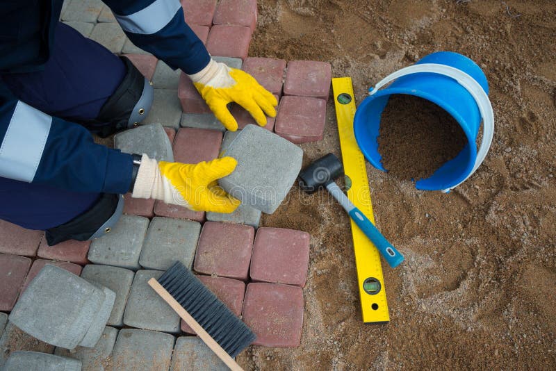 Mason Worker Making Sidewalk Pavement Stock Image - Image of helmet ...