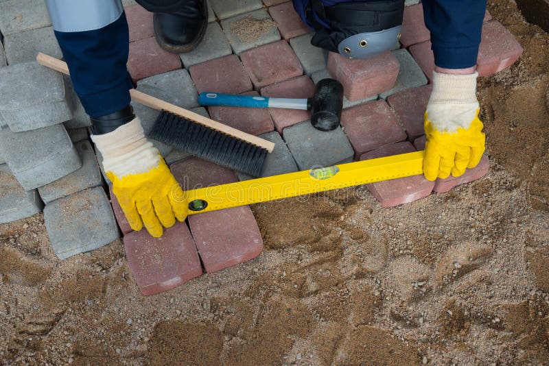Mason Worker Making Sidewalk Pavement Stock Image - Image of bricklayer ...