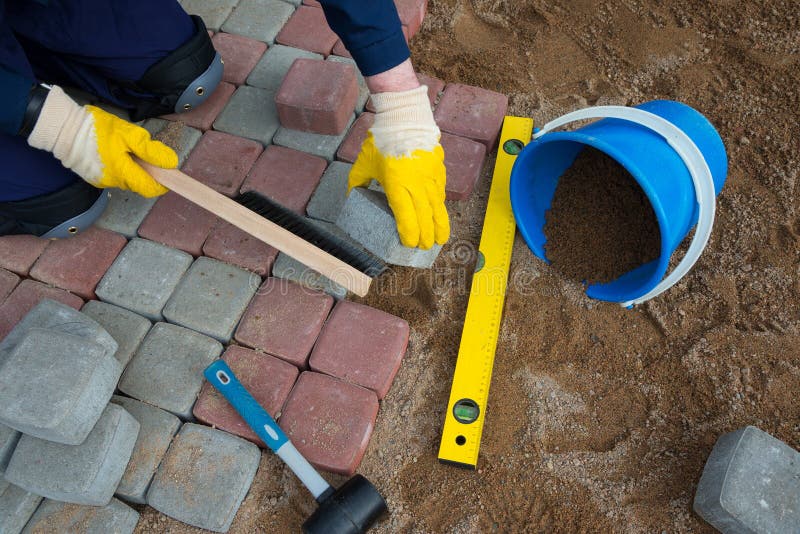 Mason Worker Making Sidewalk Pavement Stock Image - Image of pediment ...