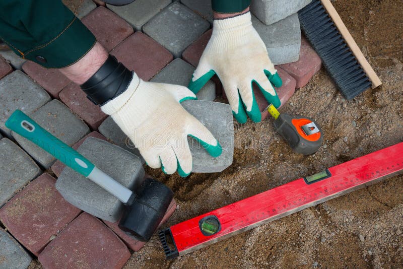 Mason Worker Making Sidewalk Pavement Stock Photo - Image of bricklayer ...