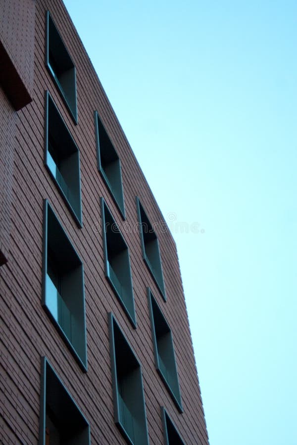 Masonry Building Facade Detail with Square Windows Stock Photo - Image ...